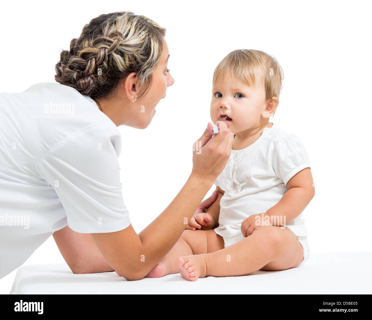 doctor examining baby isolated on white background Stock Photo - Alamy
