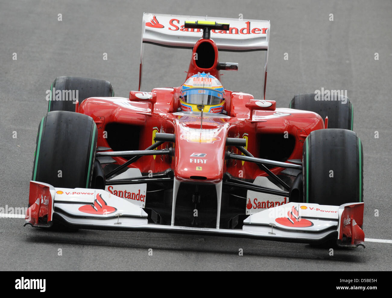 Spanish driver Fernando Alonso of Ferrari drives his car across the ...