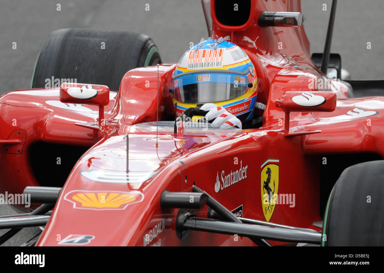 Spanish driver Fernando Alonso of Ferrari drives his car across the ...