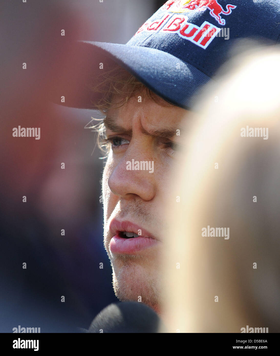 Sports motor racing vettel talking headshot portrait cap hi-res stock ...