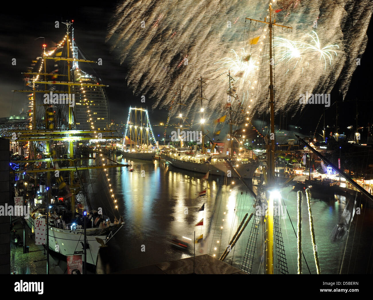 Sailships are illuminated by fireworks during the 'Sail 2010' festival ...