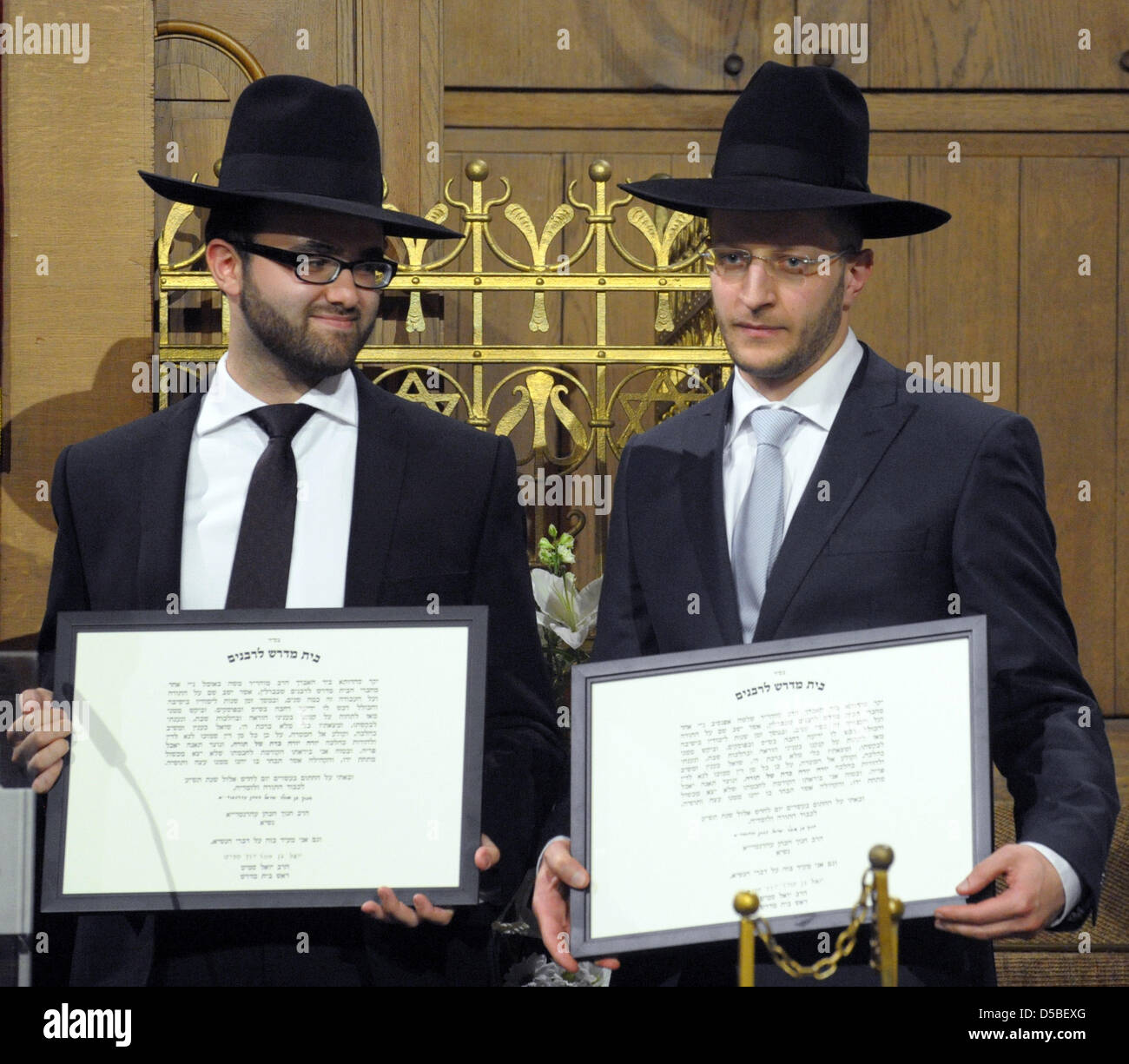 Rabbis Moshe Baumel (L) and Shlomo Afanasev (R) smile with their ...