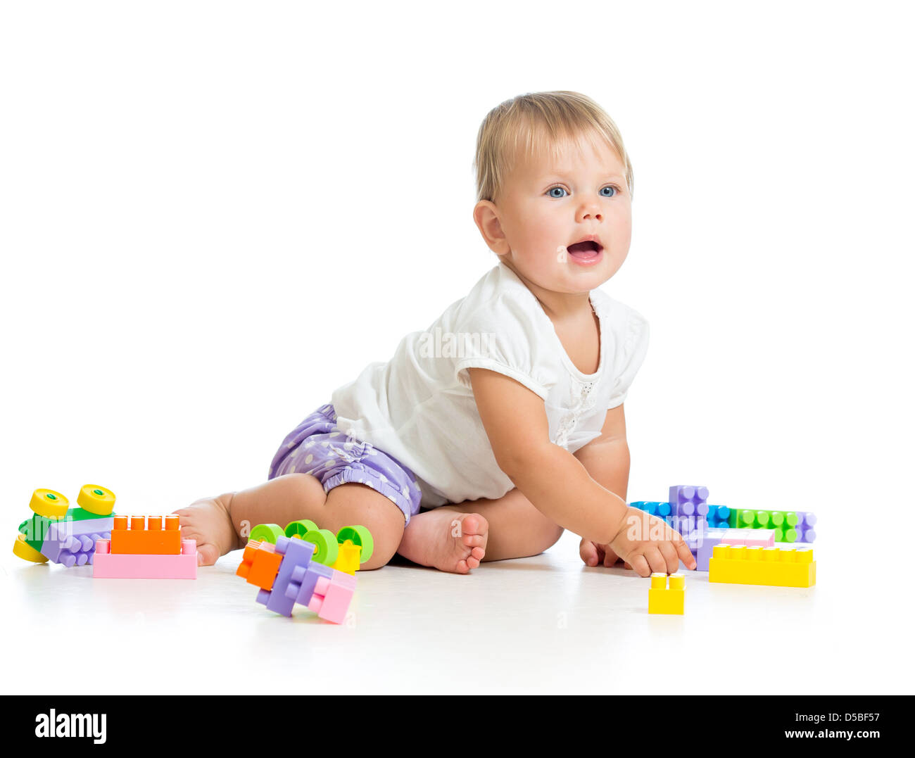 baby girl with construction set isolated on white background Stock ...