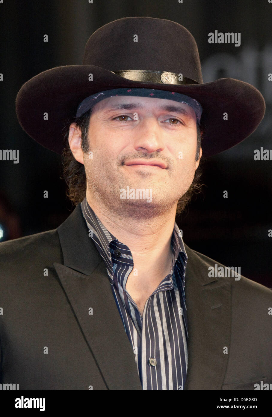 Director Robert Rodriguez attends the premiere of 'Machete' during the ...