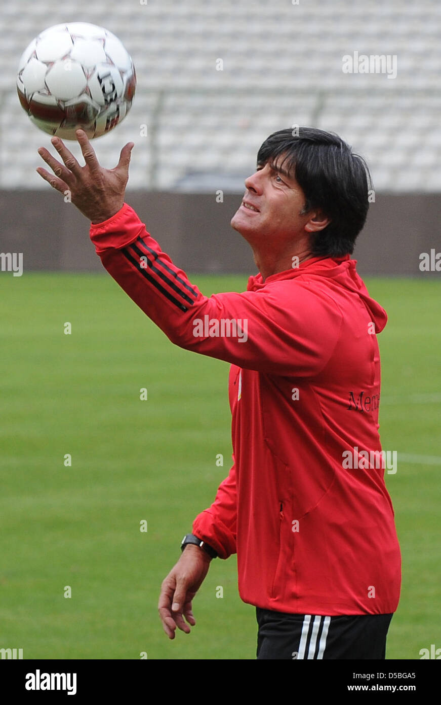 German National Coach Joachim Loew catches the ball during the final ...