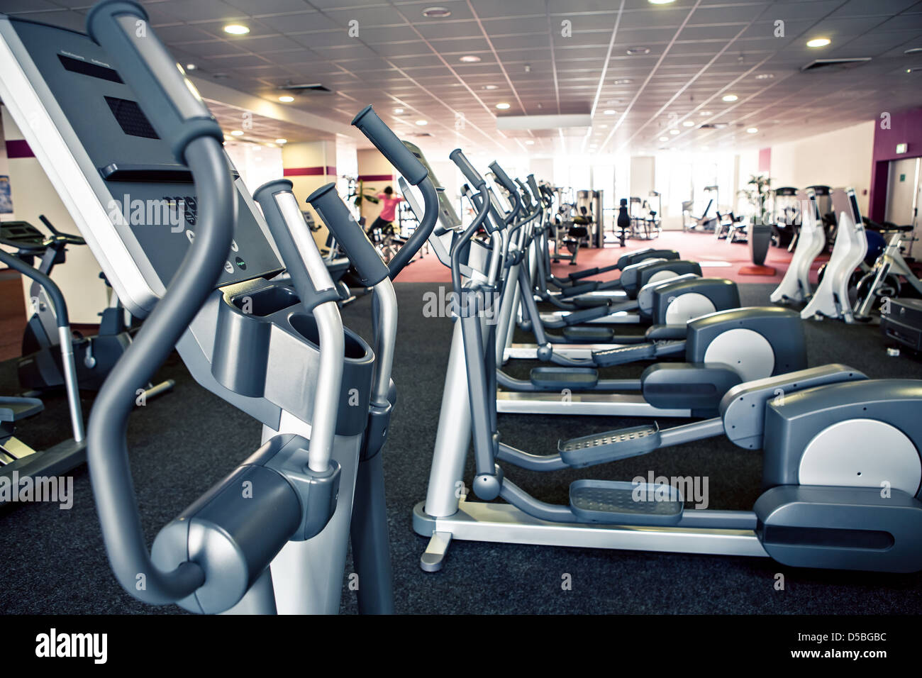 diverse equipment and machines at the gym room Stock Photo - Alamy