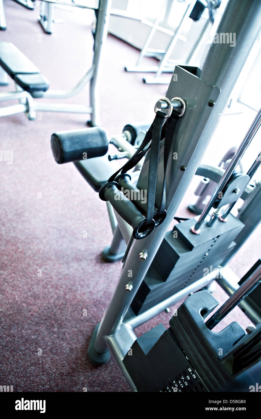 diverse equipment and machines at the gym room Stock Photo - Alamy