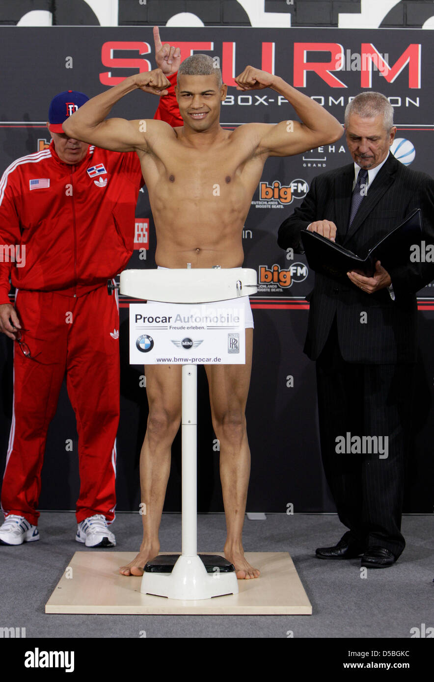 Challenger Giovanni Lorenzo stands during the official weighing at a ...