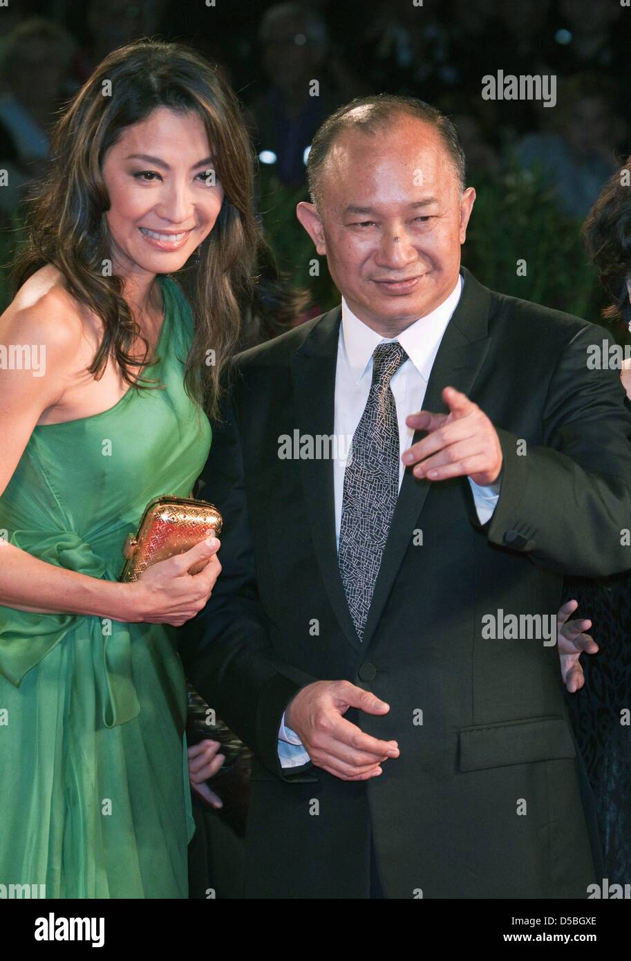 Chinese film director John Woo (R) and Hong Kong actress Michelle Yeoh ...
