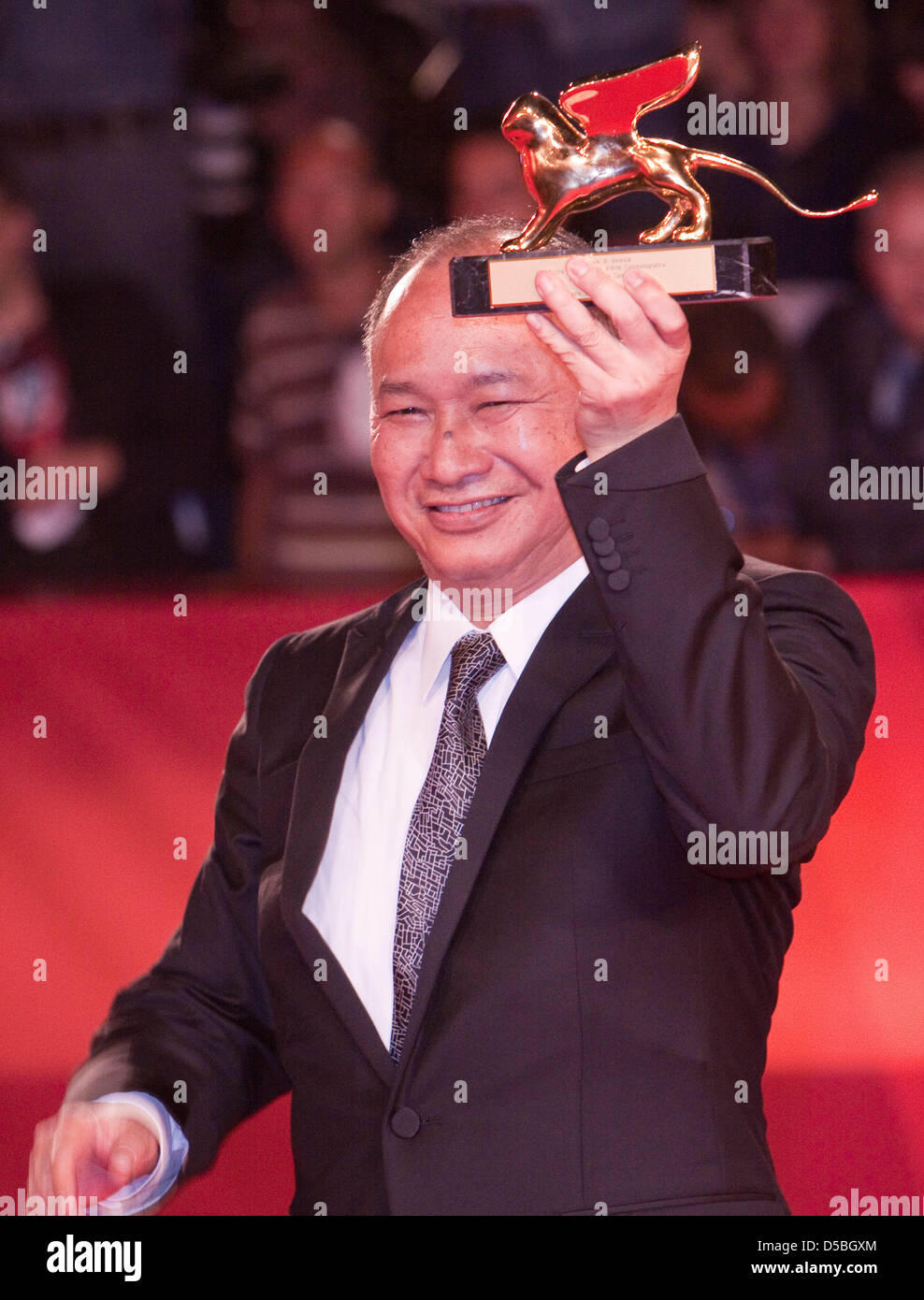Chinese film director John Woo presents his Golden Lion for Lifetime ...