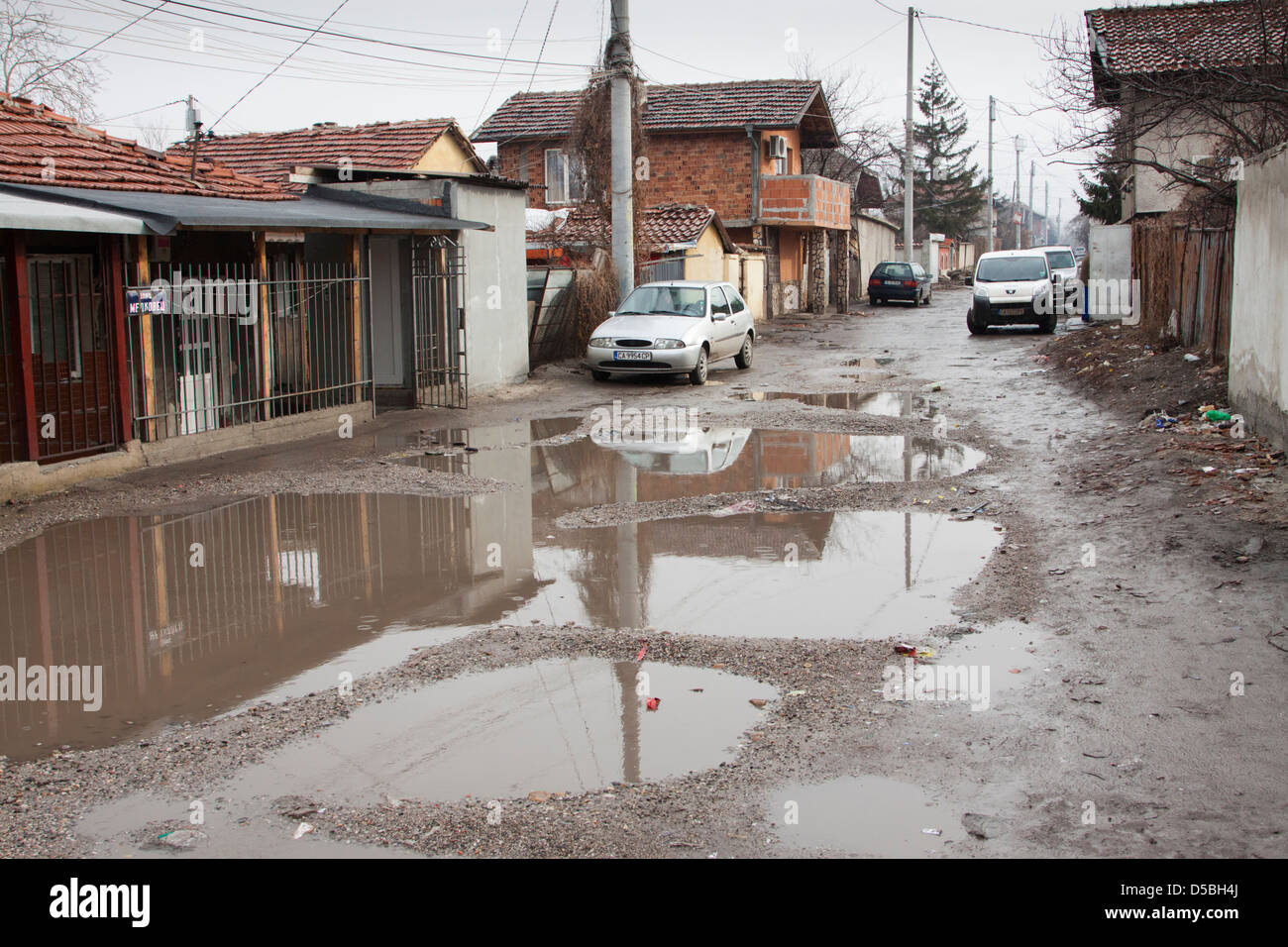 Roma ghetto 'Fakulteta' in Sofia: unpaved streets in the center of the ...