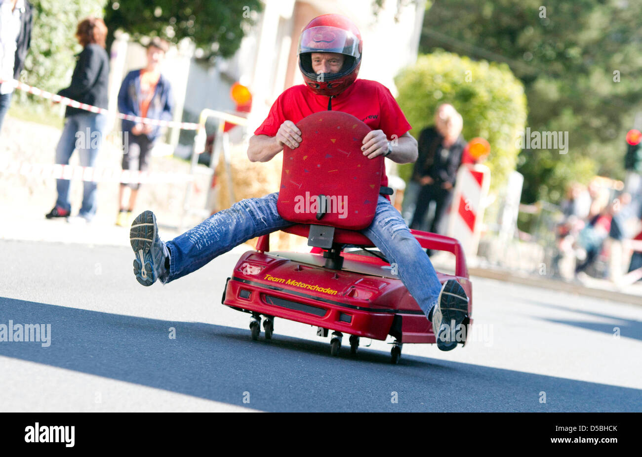 A participant of the Hessian Championships in office chair racing rolls ...