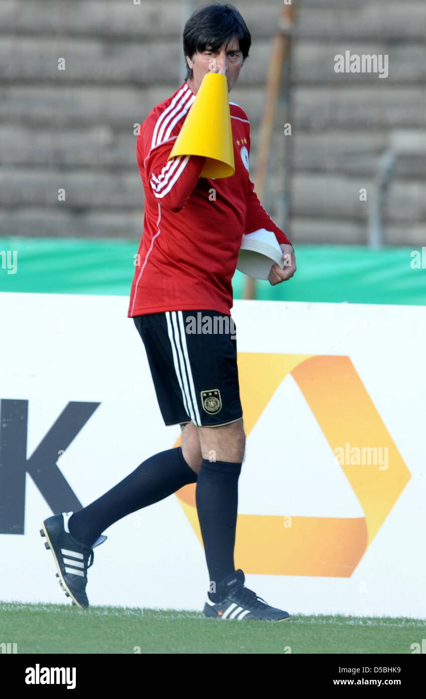 German head coach Joachim Loew observes the training of the German ...