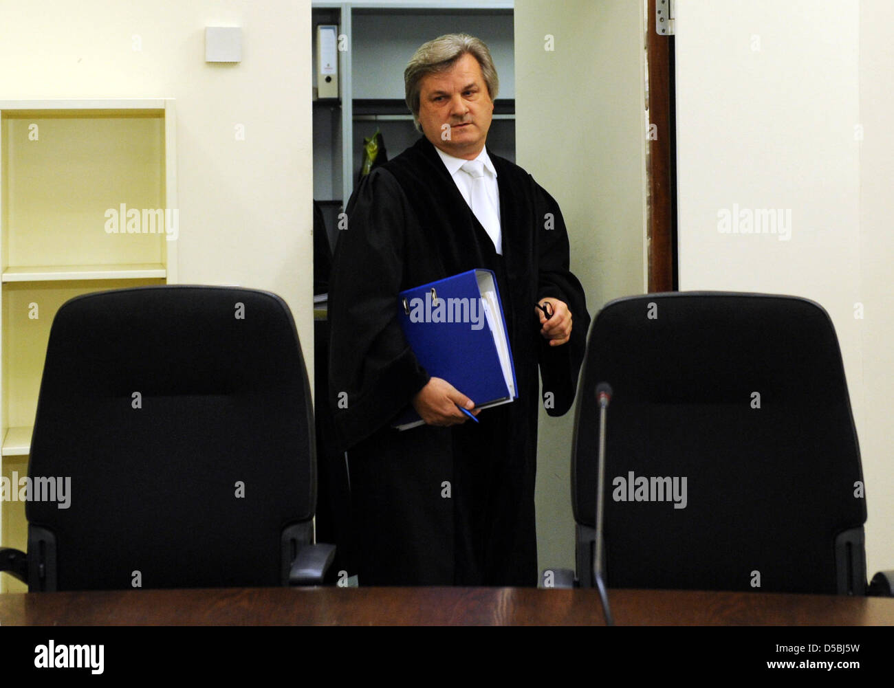 Chief judge Reinhold Baier arrives for the proclamation of the verdict ...