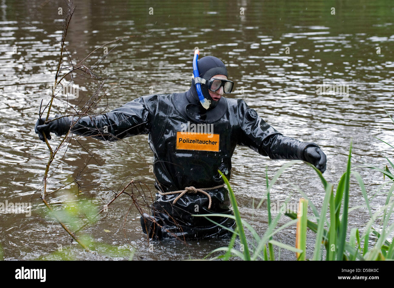 A diver is featured in a pond as he searches for 10 year-old Mirko, who ...