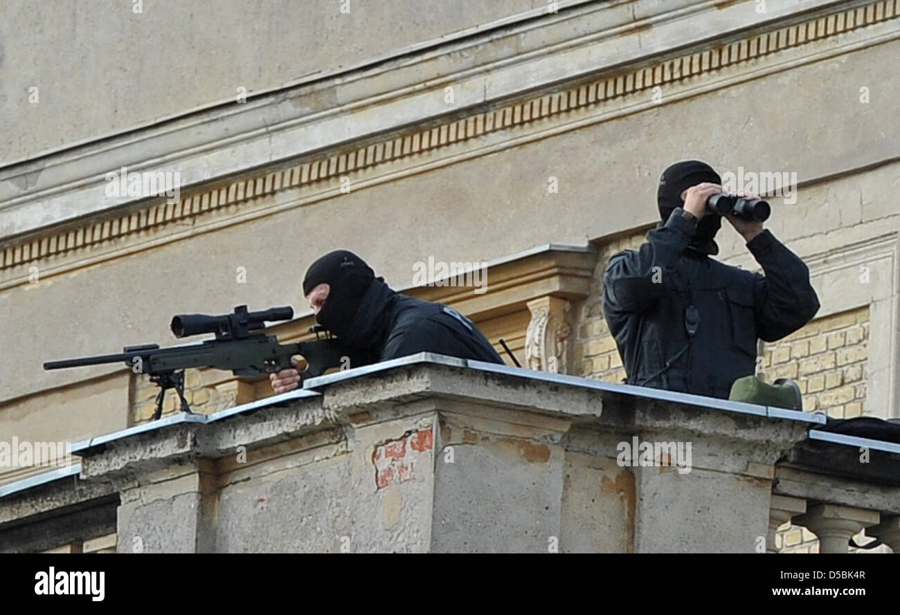 Snipers stand on a roof of the Orangerie near Sanssouci Palace in ...
