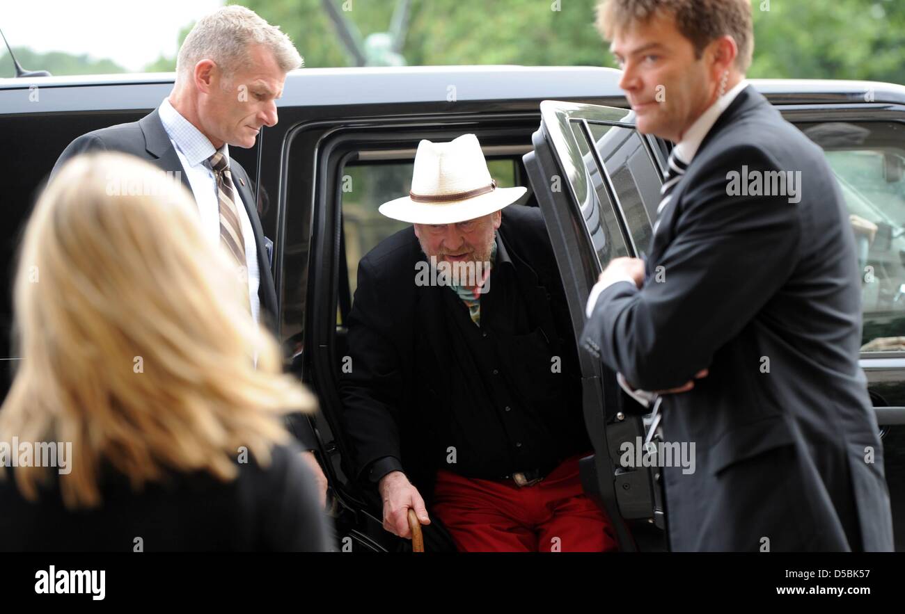 Danish cartoonist Kurt Westergaard (C), who sparked Muslim anger with ...