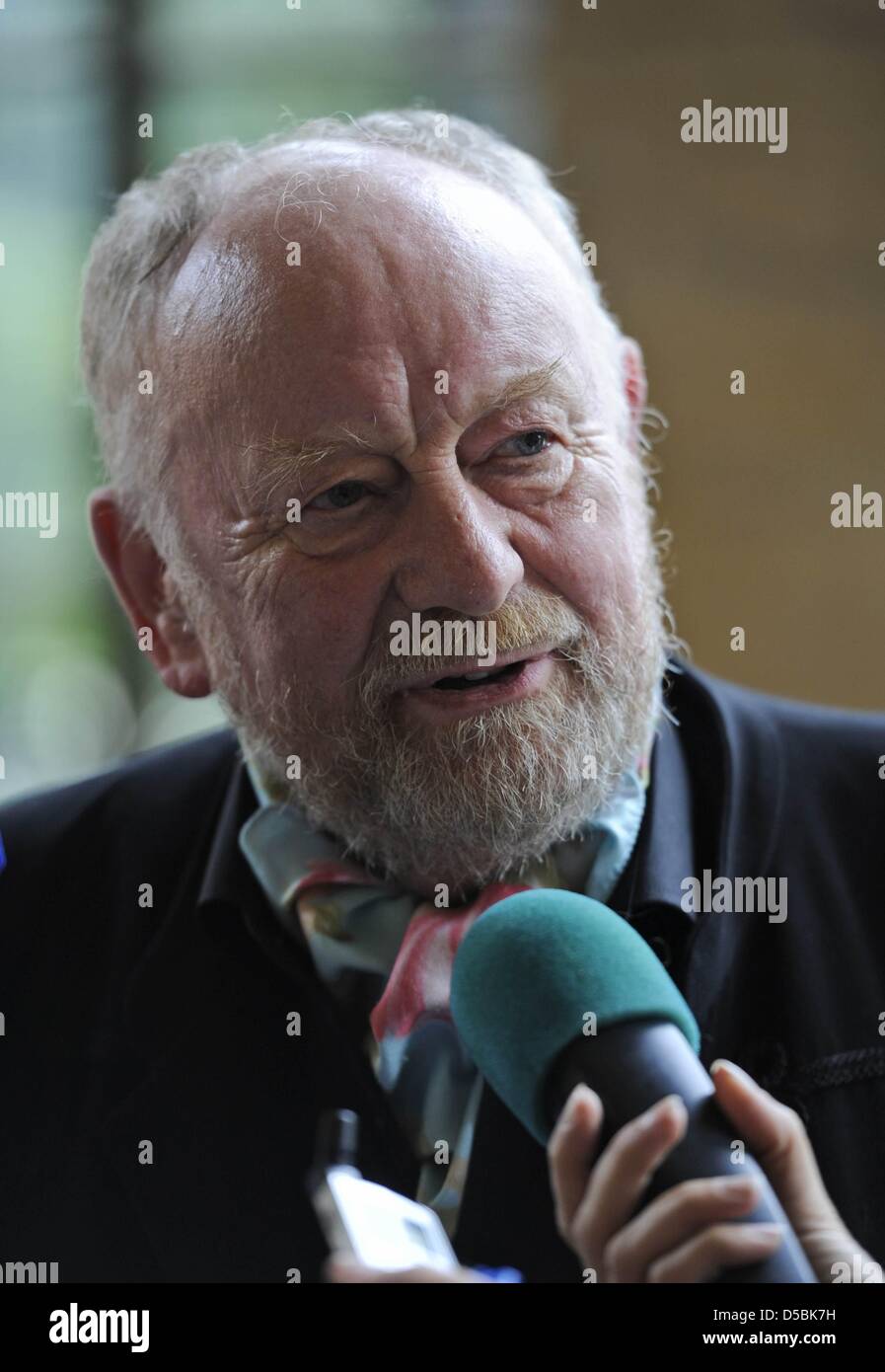 Danish cartoonist Kurt Westergaard answers questions during a press ...