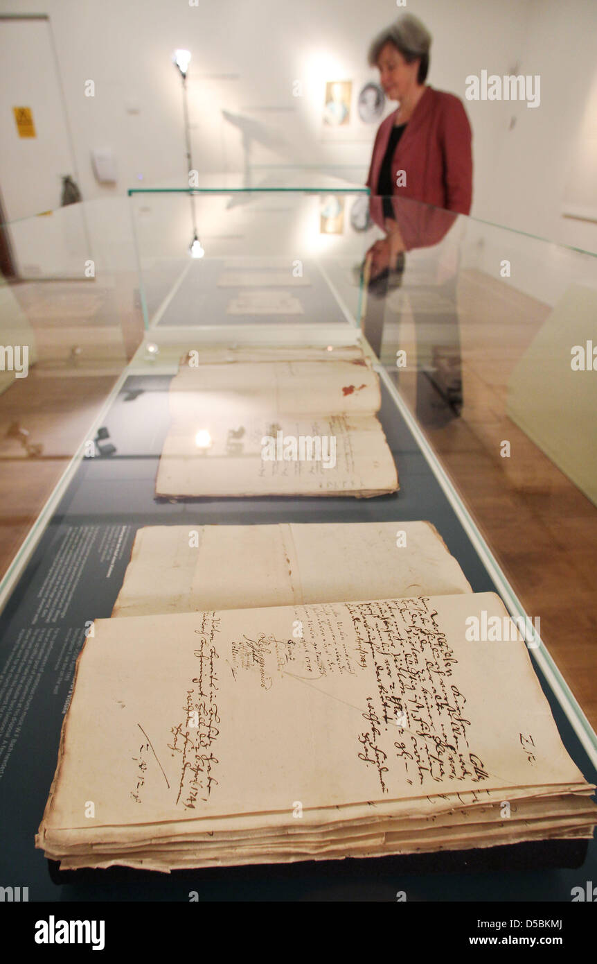 A woman examines records of the life of Wilhelm Friedemann Bach at an ...