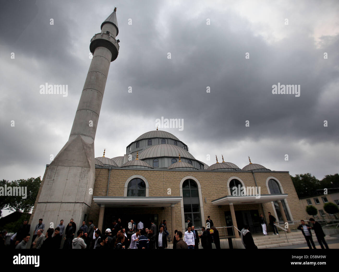 Mulsims leave the Merkez Mosque after the Jumu'ah (Friday prayer) in ...
