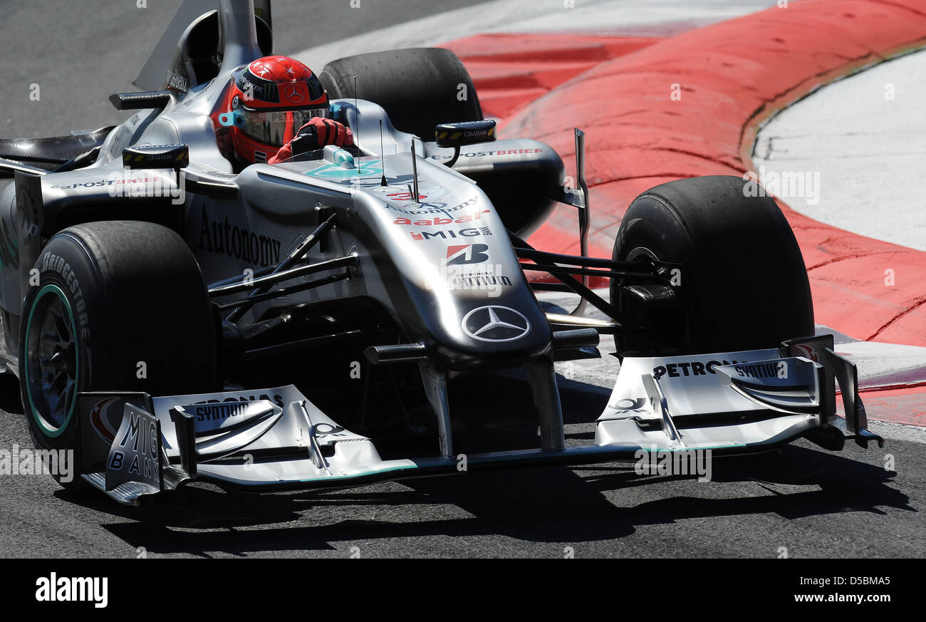 German driver Michael Schumacher of Mercedes GP drives through a turn ...