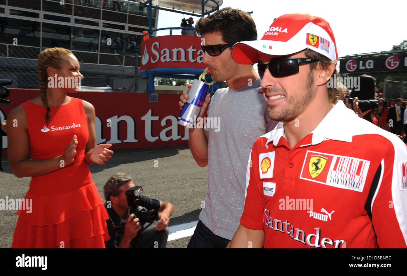 Australian driver Mark Webber (L) of Red Bull and Spanish driver ...