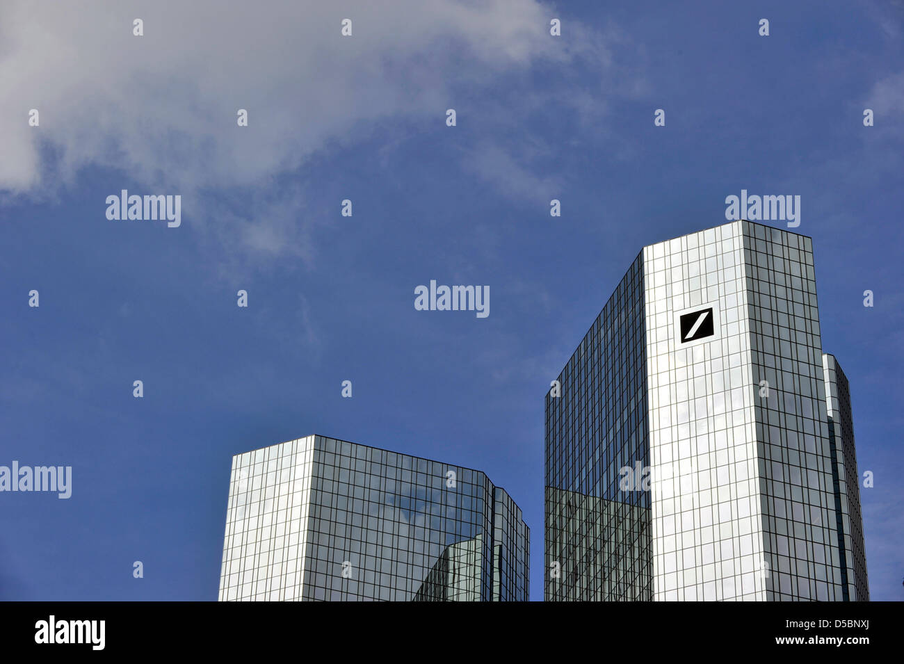 The headquarters of Deutsche Bank loom against the sky in Frankfurt ...
