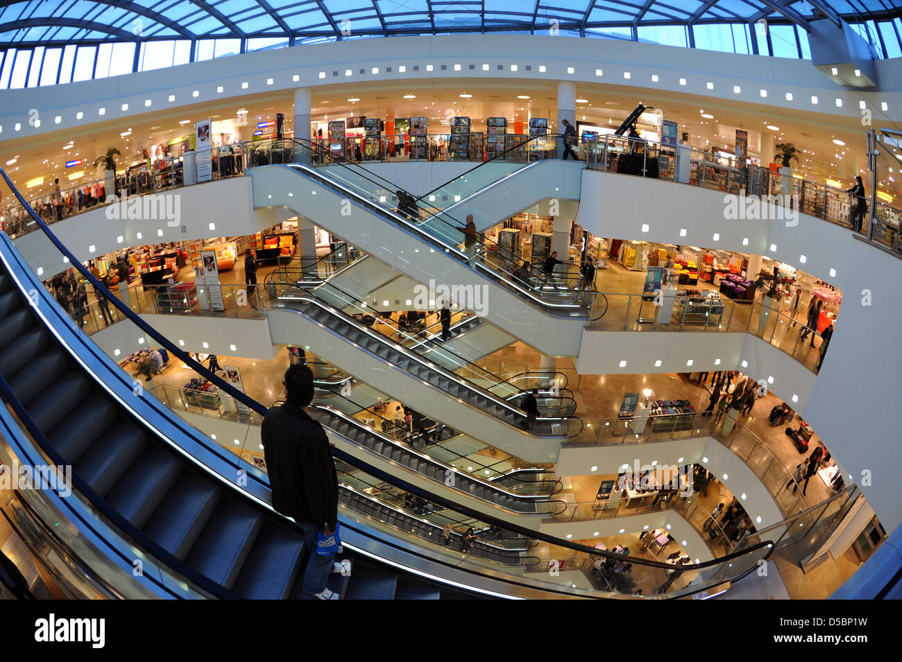 People shop at Karstadt department store in Leipzig, Germany, 03 ...