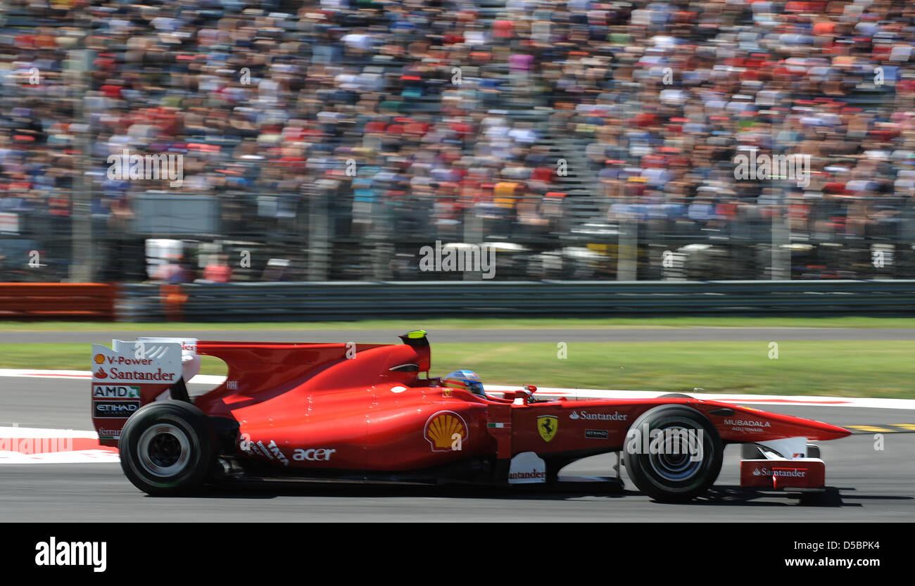 Spanish driver Fernando Alonso of Scuderia Ferrari comes through ...