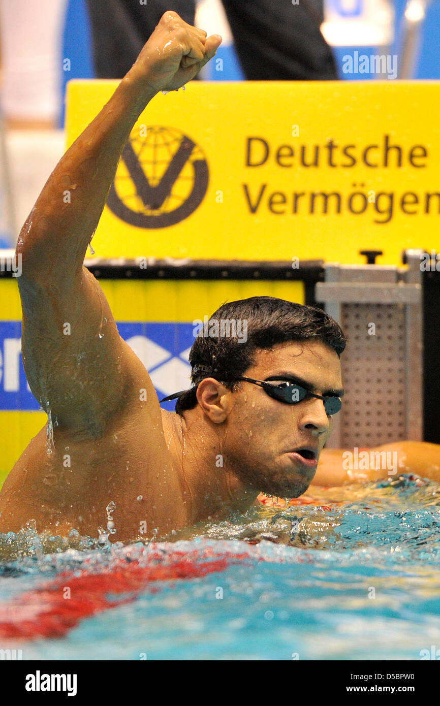 Brazilian swimmer Castro Frederico celebrates his win in the men's 200 ...