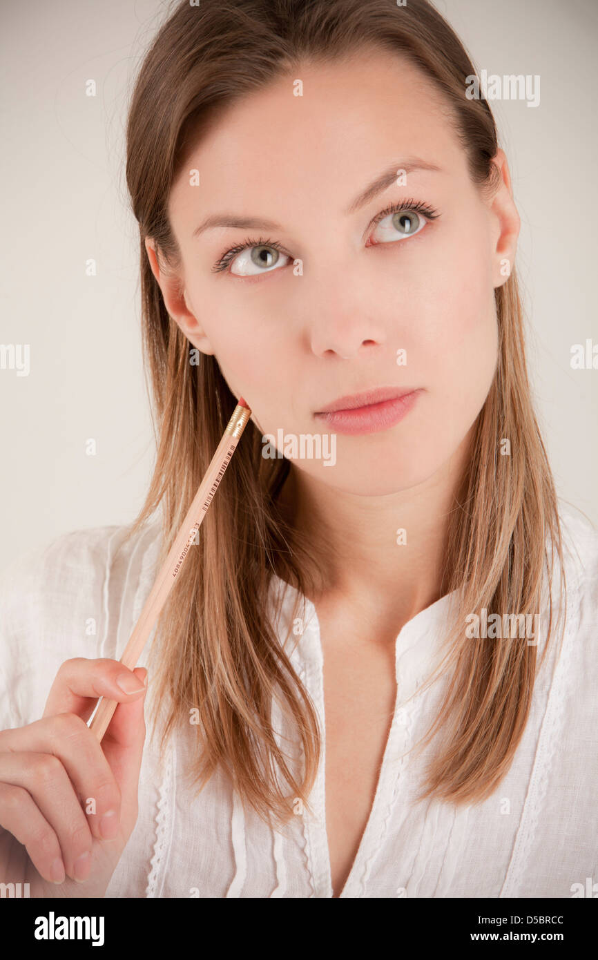 woman with pencil Stock Photo - Alamy