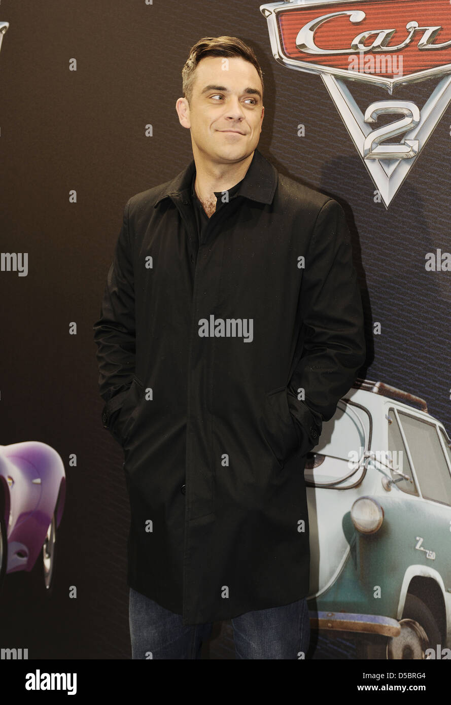 Robbie Williams at the premiere of 'Cars 2' at Mathaeser Filmpalast ...
