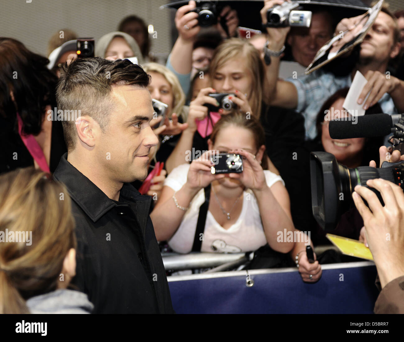 Robbie Williams at the premiere of 'Cars 2' at Mathaeser Filmpalast ...