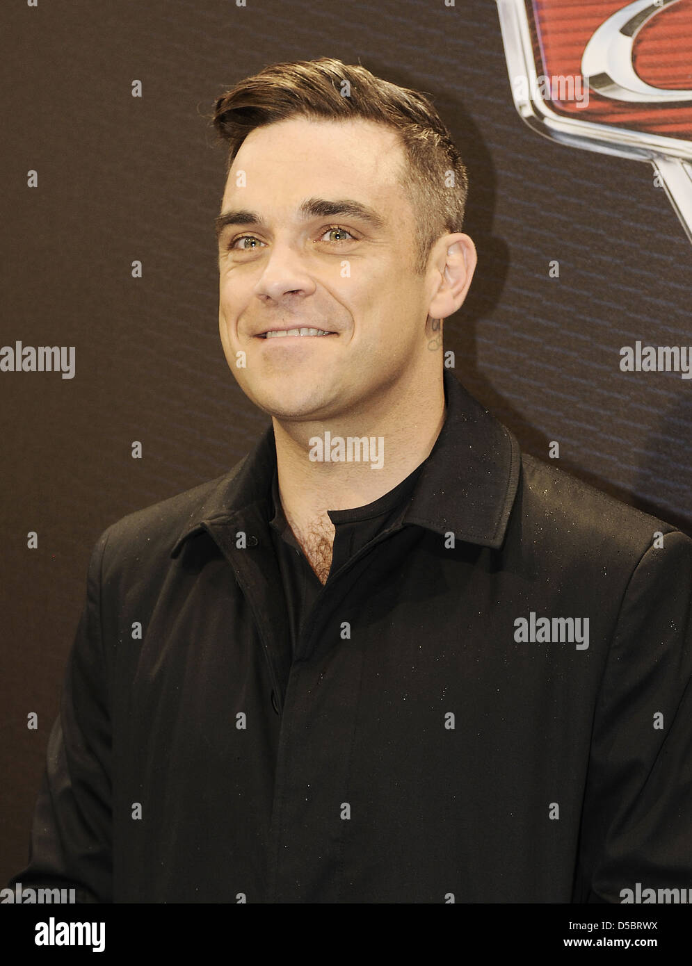 Robbie Williams at the premiere of 'Cars 2' at Mathaeser Filmpalast ...