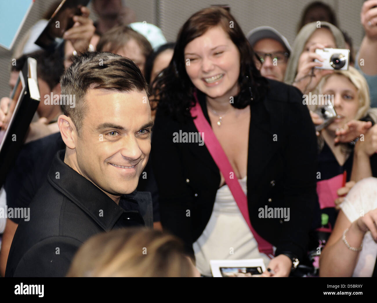 Robbie Williams at the premiere of 'Cars 2' at Mathaeser Filmpalast ...