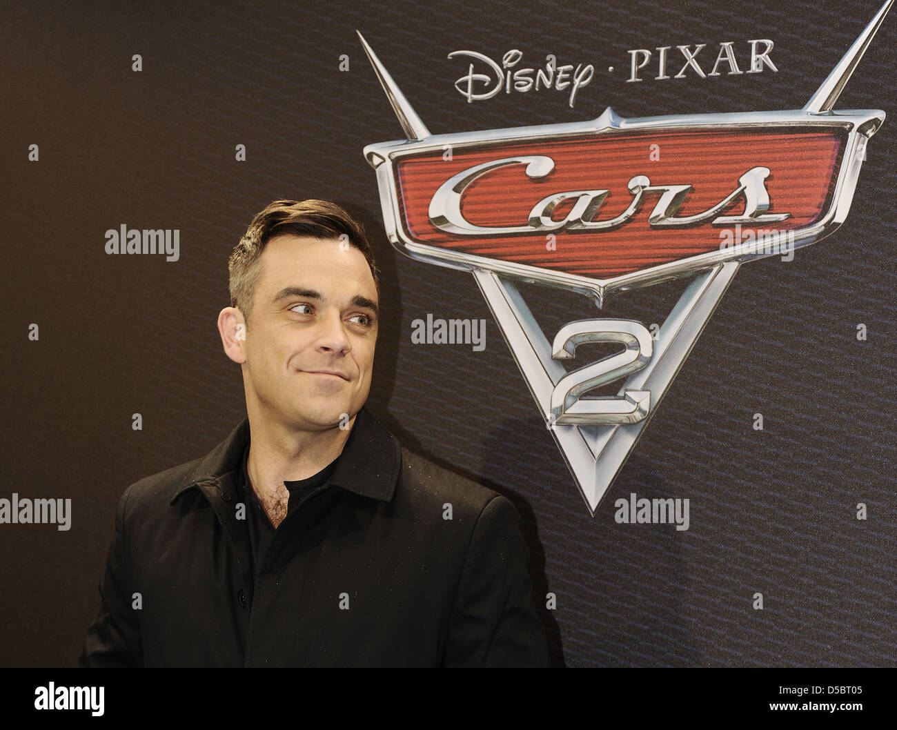 Robbie Williams at the premiere of 'Cars 2' at Mathaeser Filmpalast ...