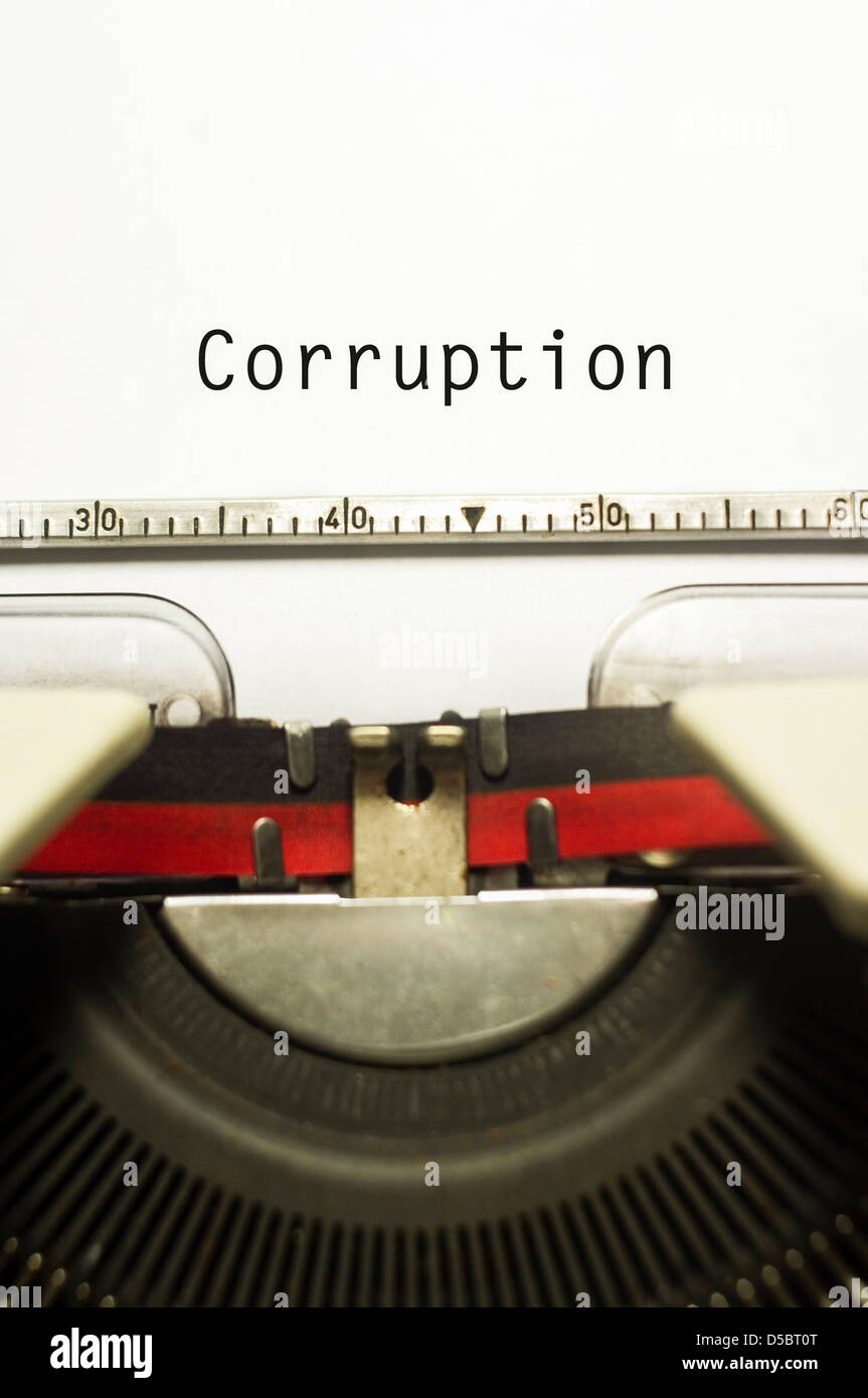 corruption concepts, with message on typewriter paper Stock Photo - Alamy
