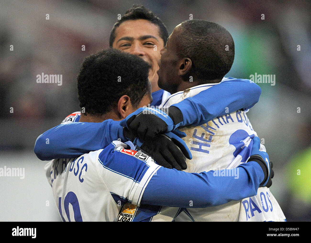 Berlin's Raffael cheers with his teammates Cicero and Adrian Ramos (L-R ...