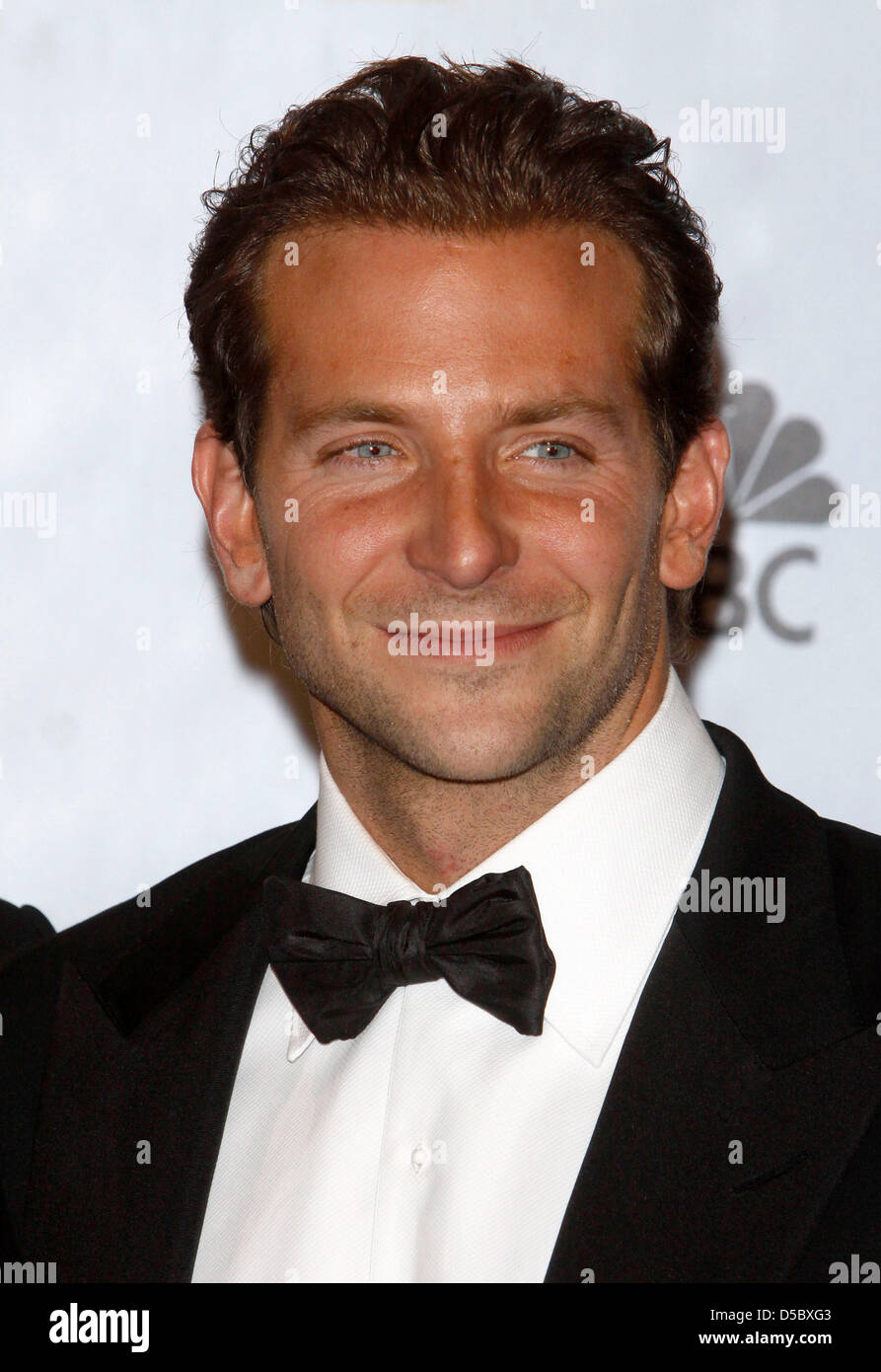 US actor Bradley Cooper poses for photographers in the press room at ...