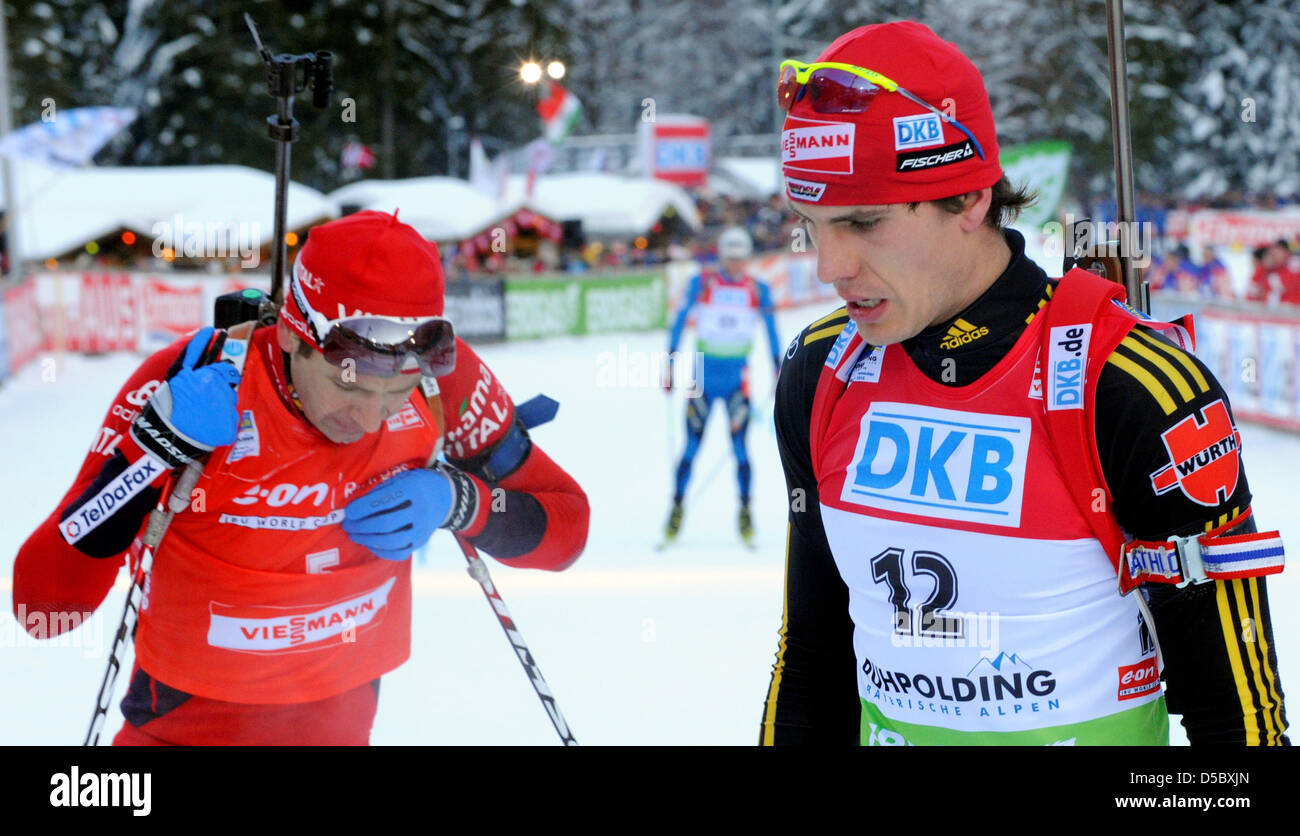 Germany's Arnd Pfeiffer (R) and Ole Einar Bjoerndalen at the finish ...