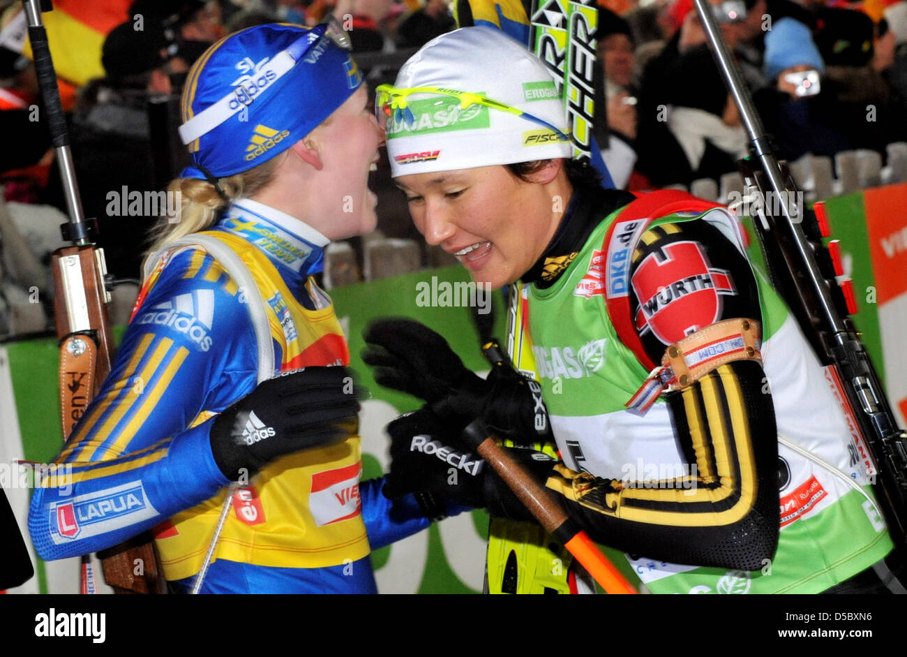 Sweden's Helena Jonsson (L) and Germany's Simone Hauswald (R) cheer ...