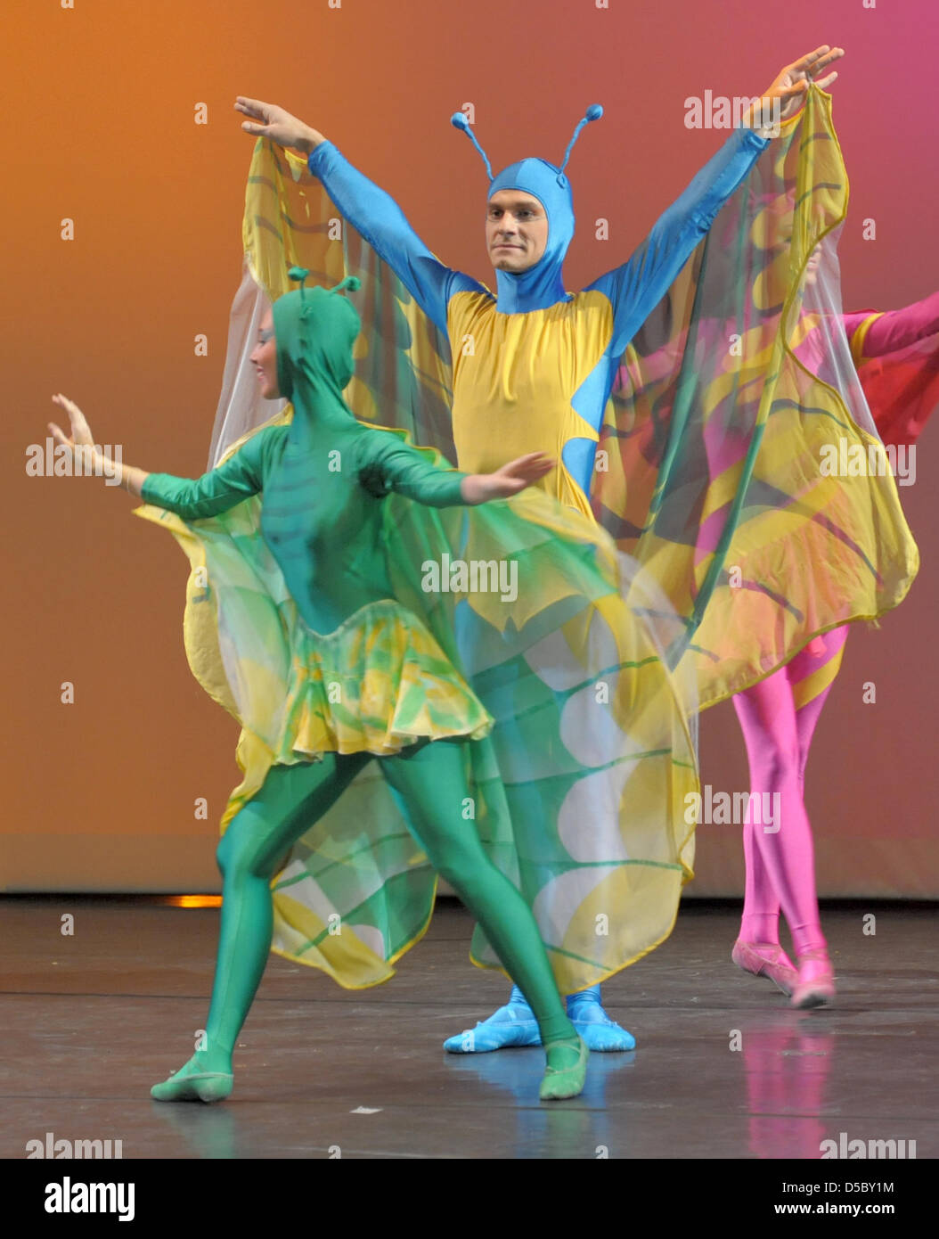 Colourful insects dance during the children's programme "birds' wedding ...
