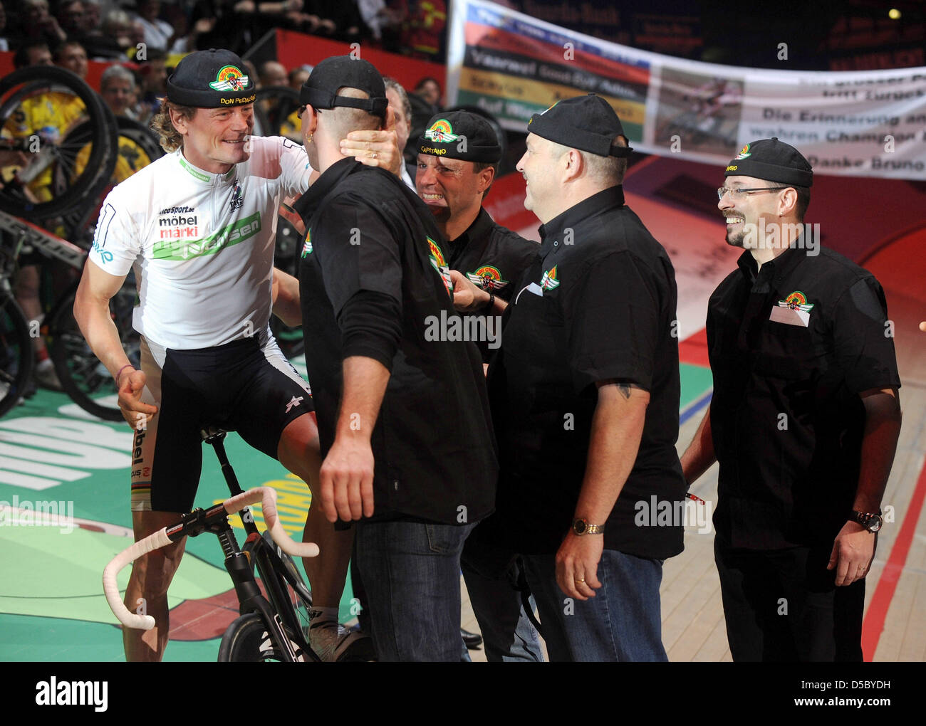 Swiss cyclist Bruno Risi (L) is welcomed to the motor cycling club 'Los ...