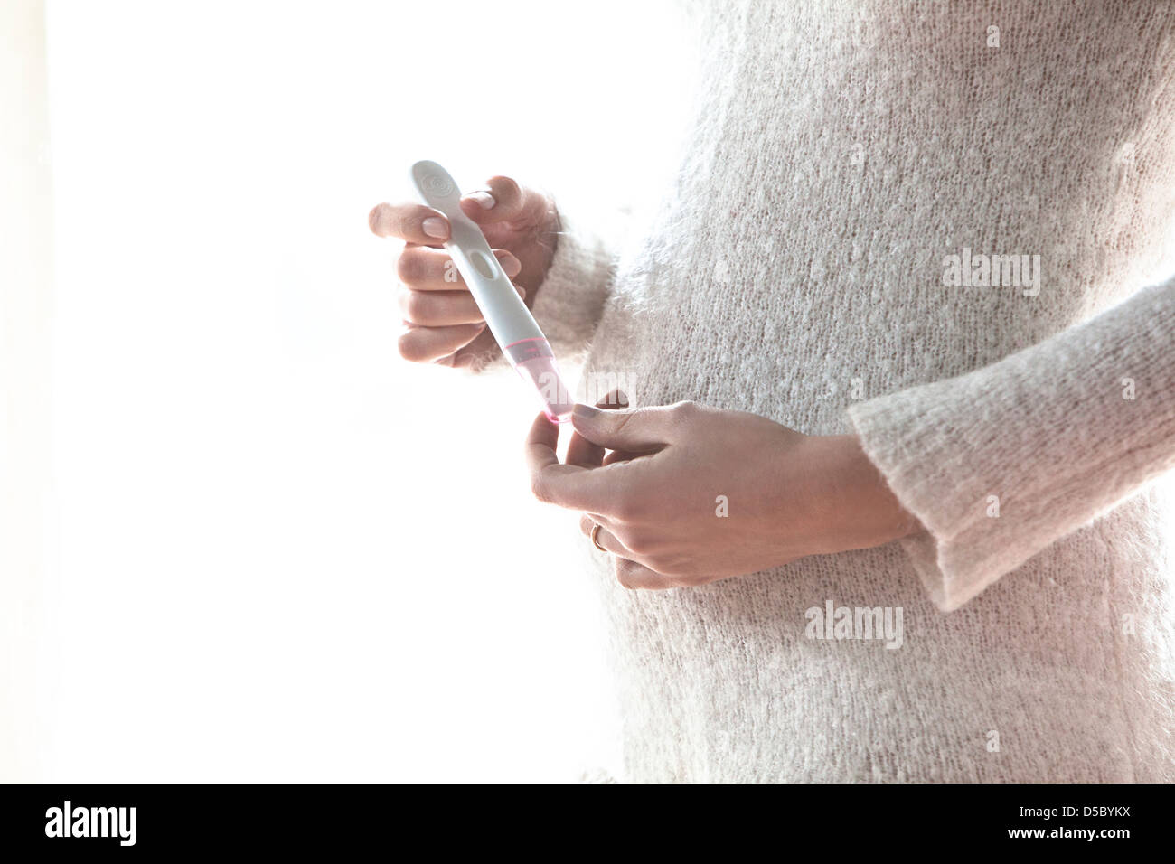 Pregnant test woman hands hi-res stock photography and images - Alamy