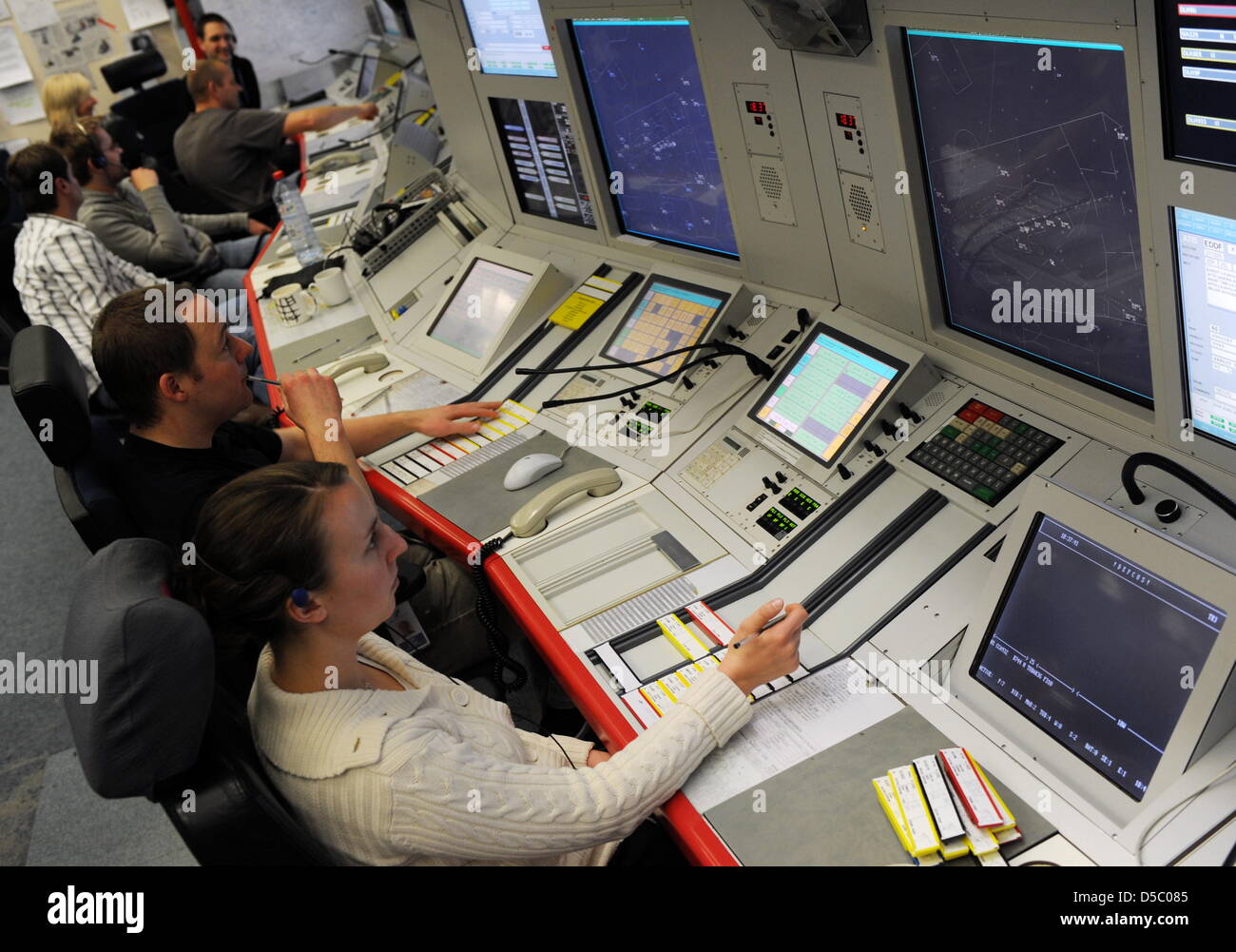 Flight coordinators sit in front hi-res stock photography and images ...