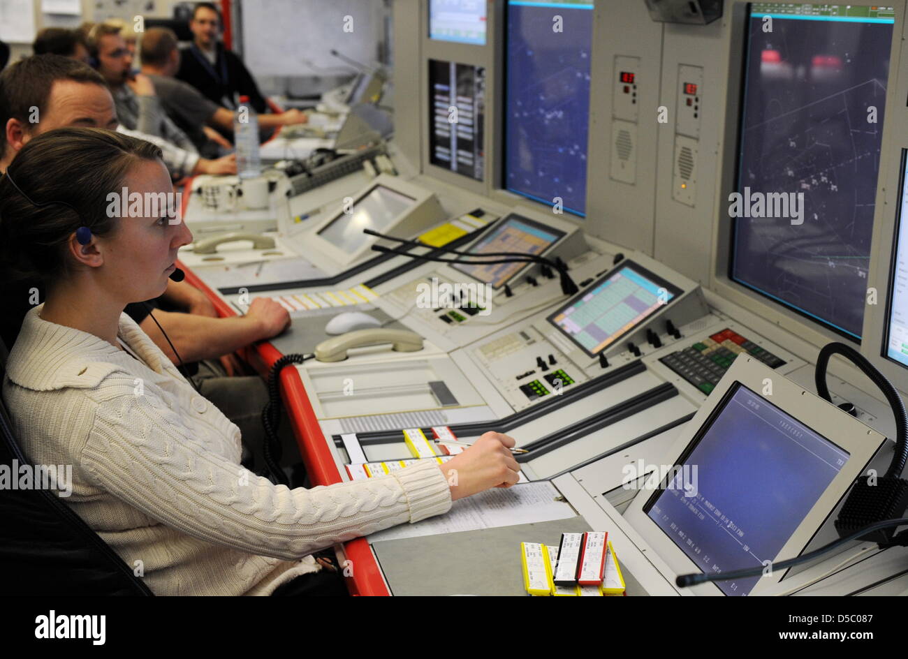Flight coordinators sit in front hi-res stock photography and images ...