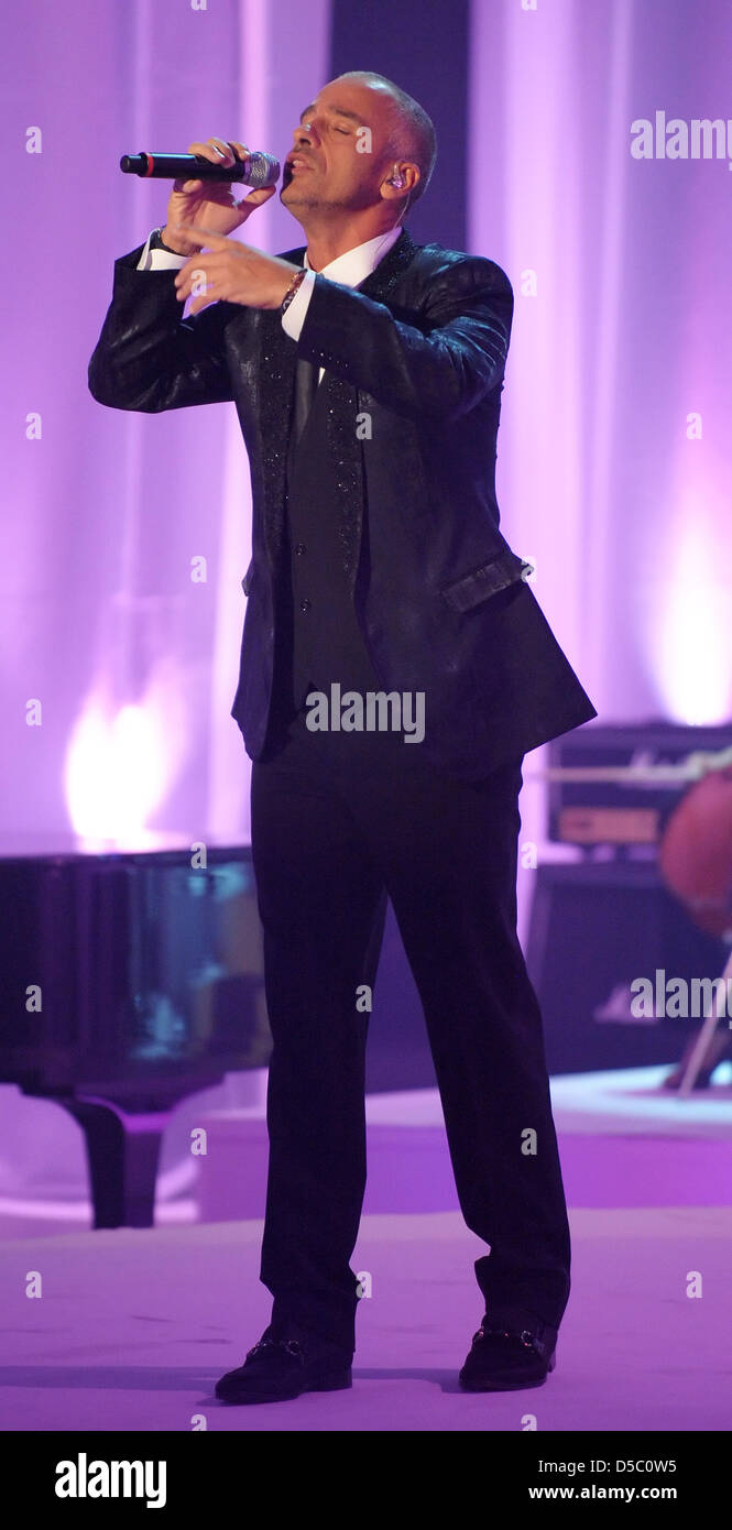 Italian pop singer Eros Ramazzotti performs during live broadcast of ...