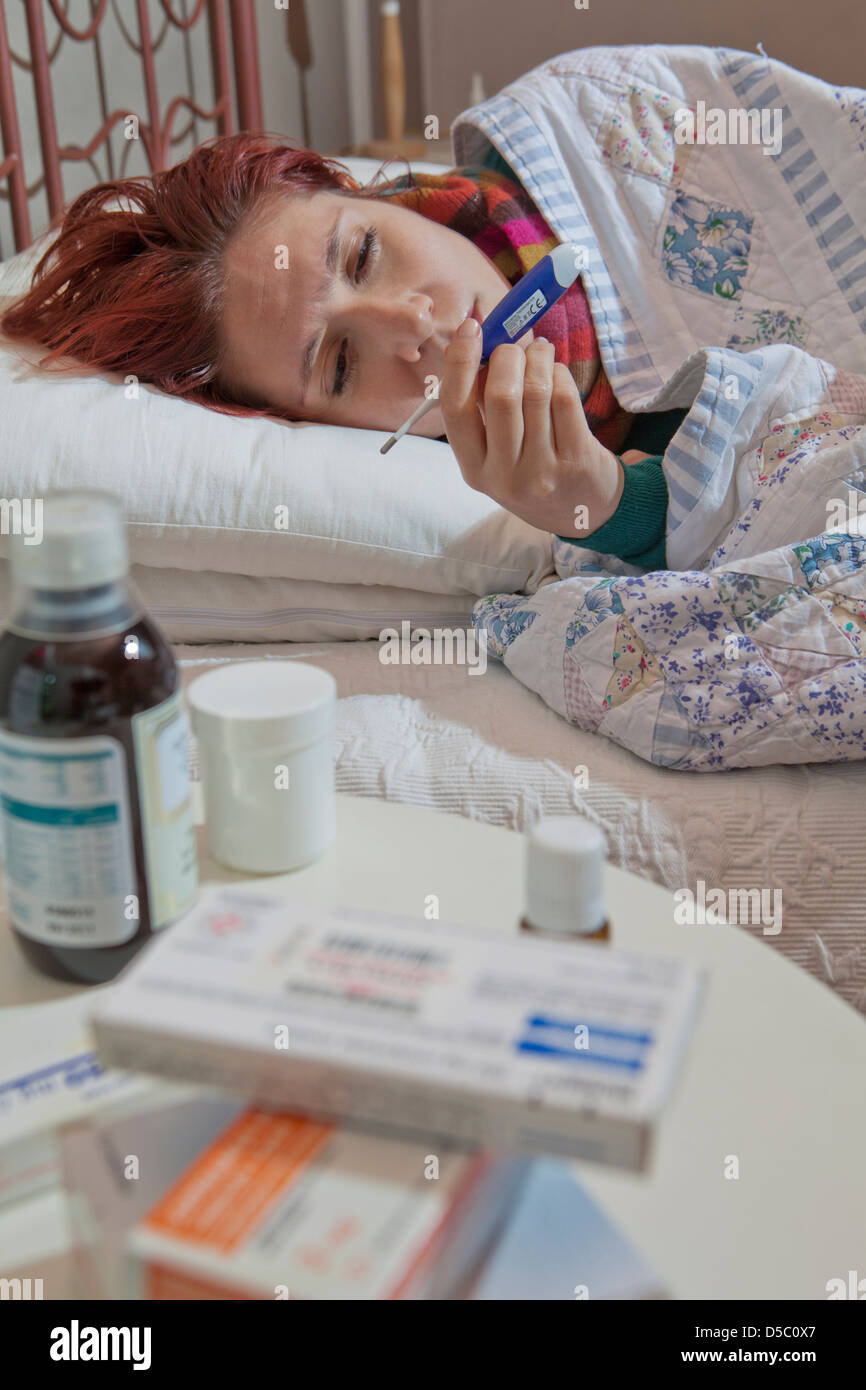 woman in bed with the flu Stock Photo - Alamy