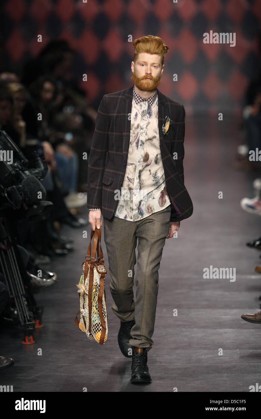 A model wears a creation of Paul Smith Men's fashion fall winter 2010 ...