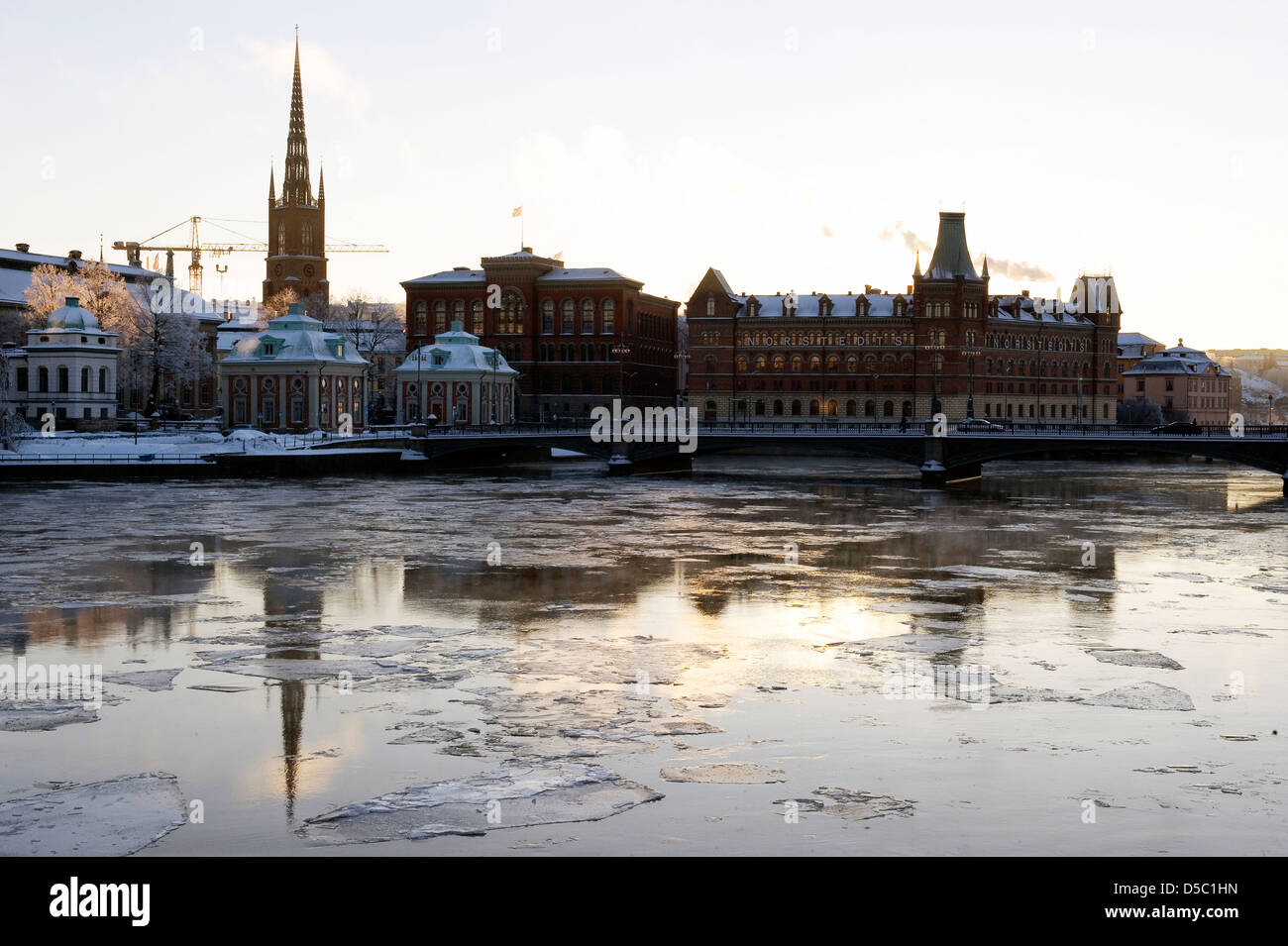 Sheets of ice flow through the centre of Stockholm, Sweden, showing the ...